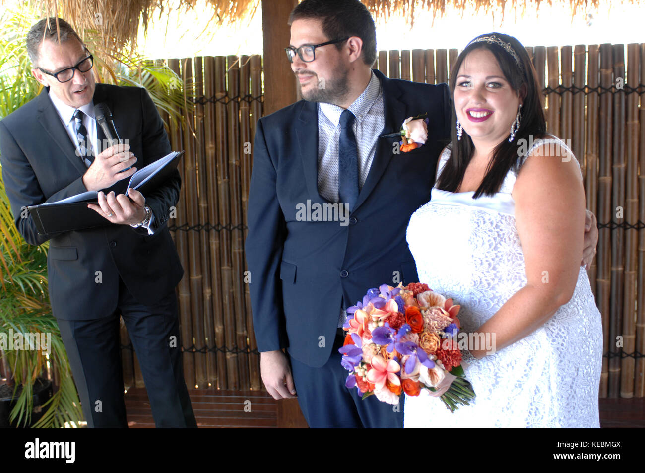 Young Couple getting married at home Stock Photo - Alamy