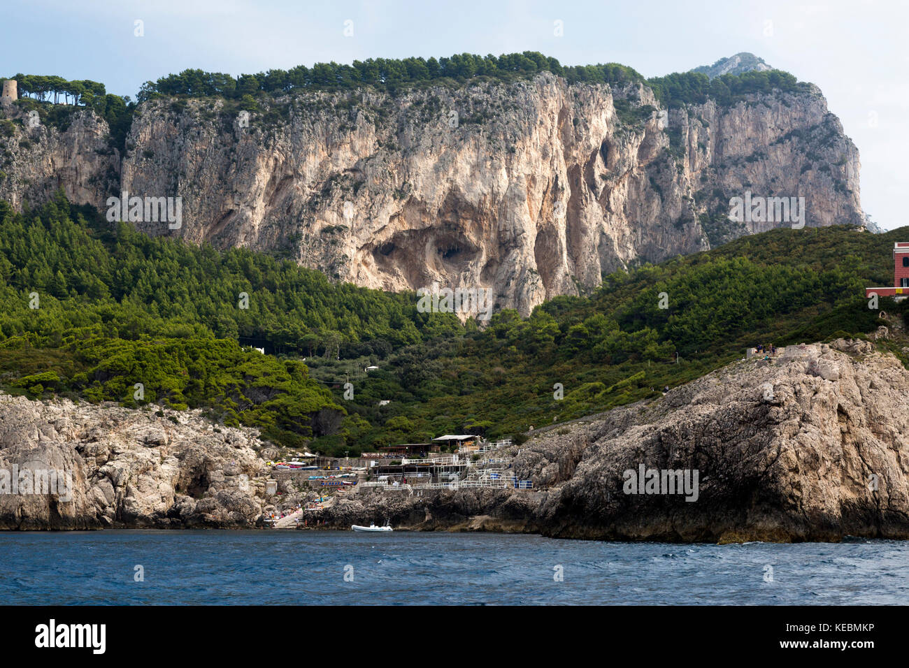 View from ocean of Capri. Dramatic limestone cliffs with face Stock ...