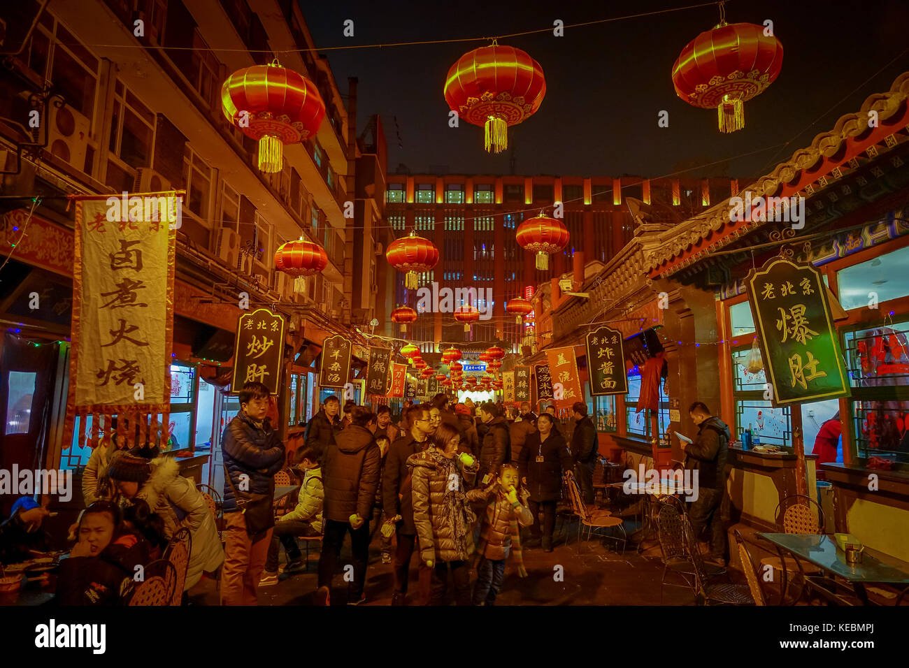 BEIJING, CHINA - 29 JANUARY, 2017: People walking around charming ...