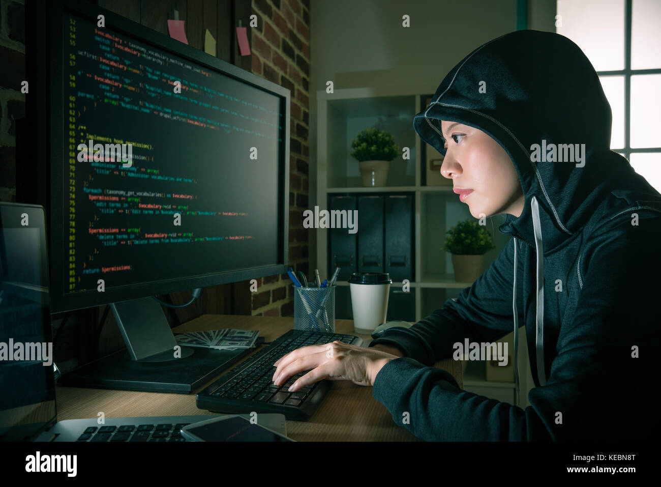 attractive beauty girl using code language hacking online system to ...