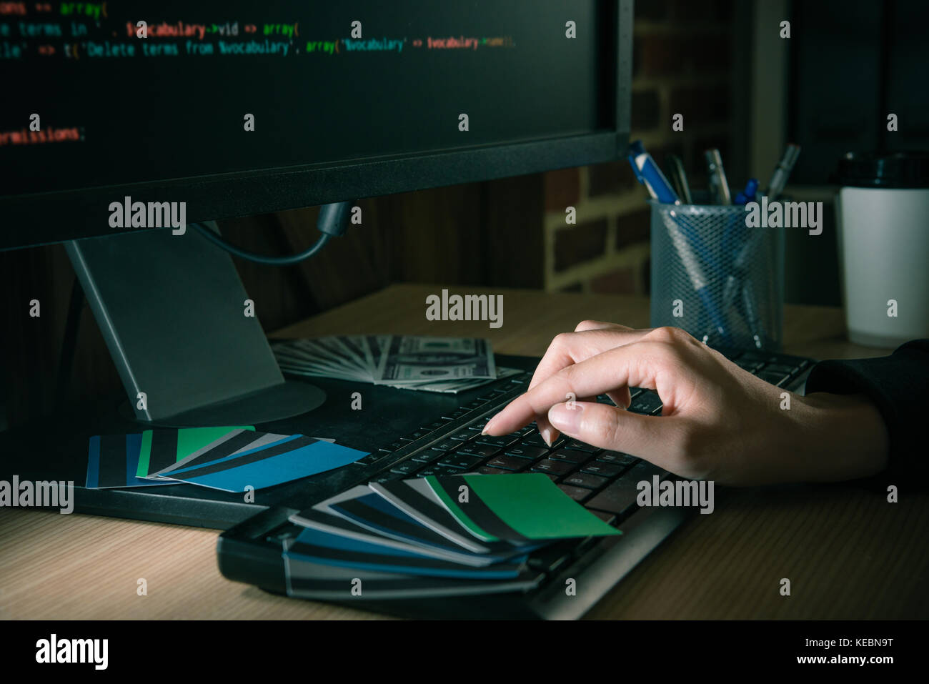 closeup photo of female hacker using computer internet system and ...