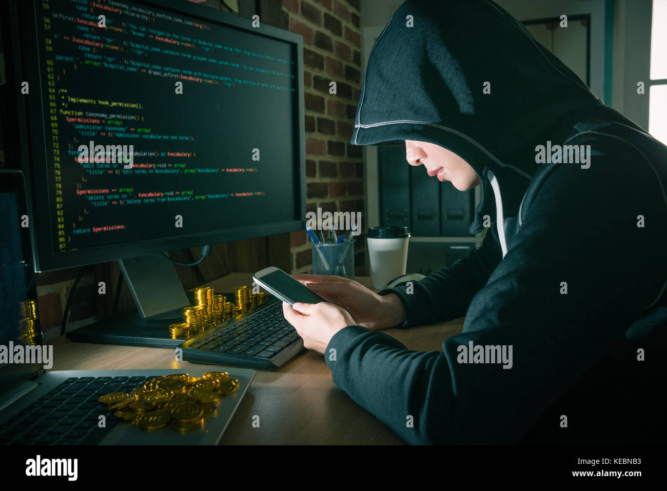 pretty attractive woman hacker using mobile smartphone working and ...