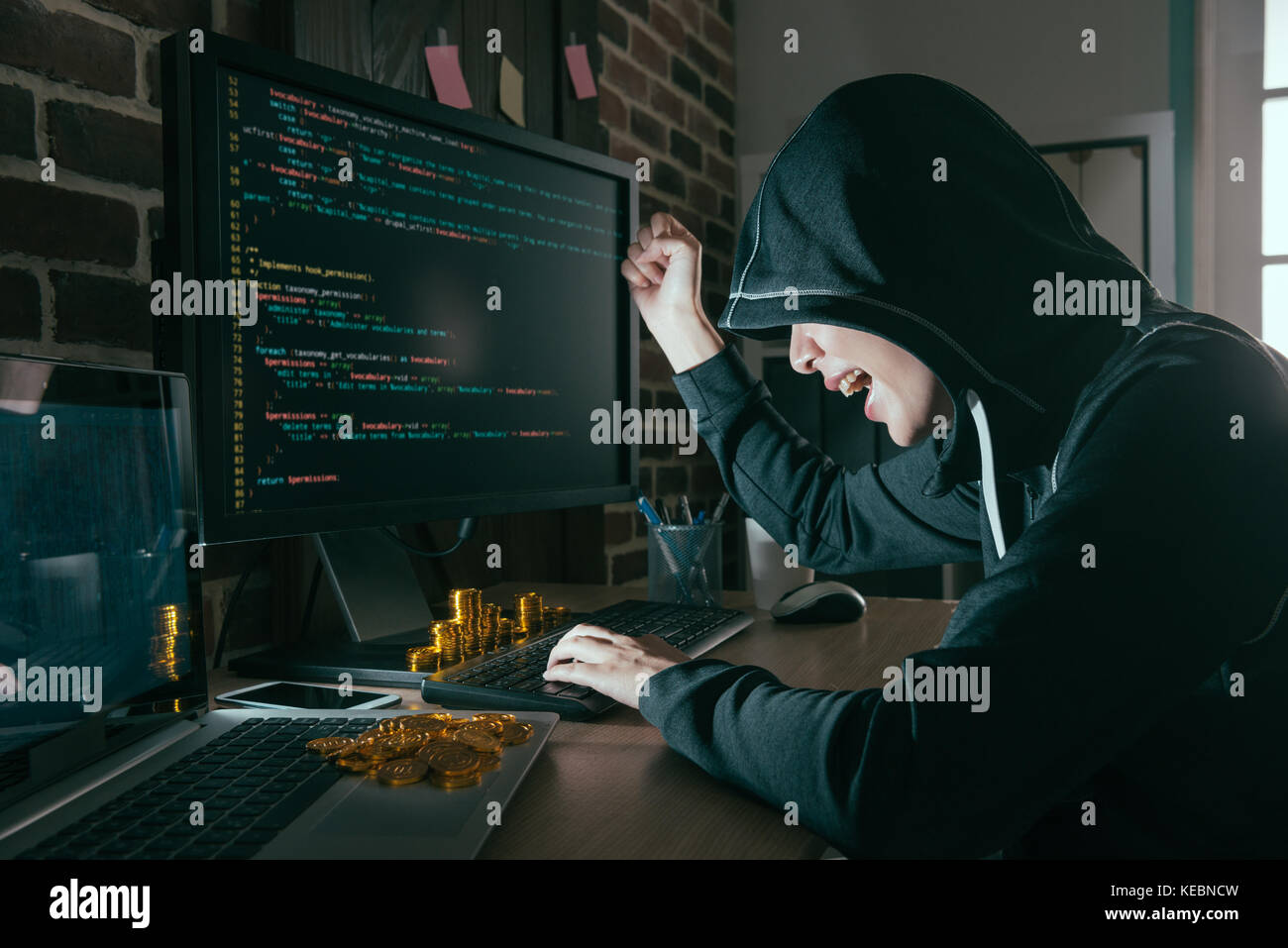 happy beautiful hacker raised hand celebration successful when she ...