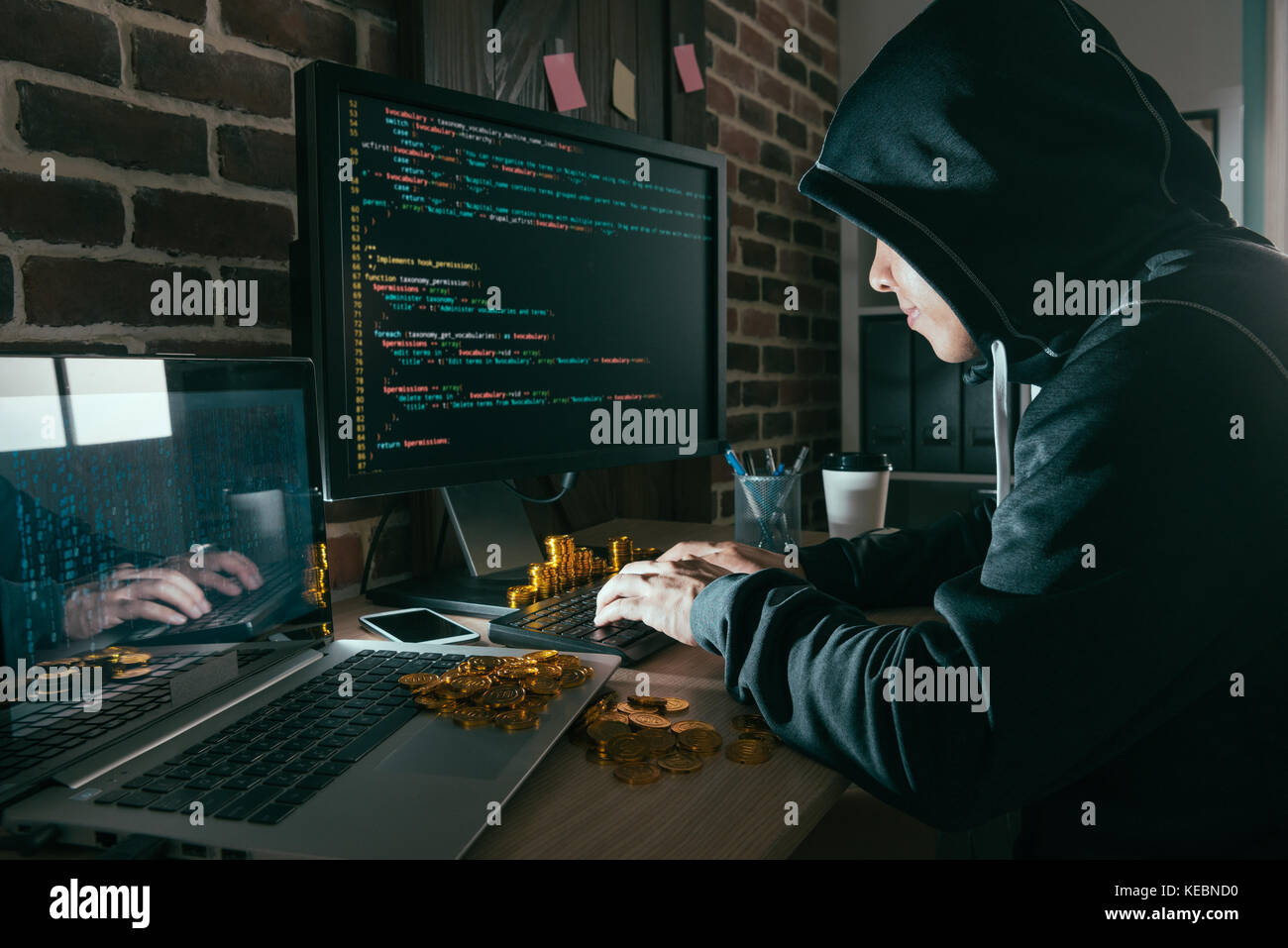 young hacker having many bitcoin through using data virus steal ...