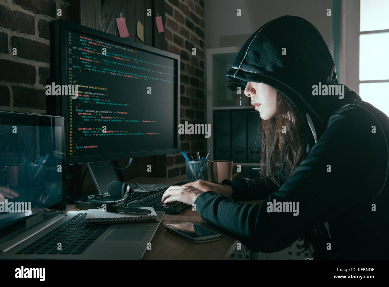 Young Professional Female Hacker Using Keyboard Typing Bad Data Into