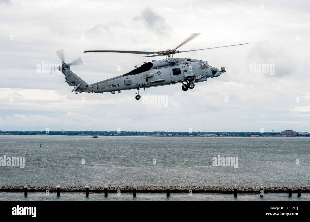 An MH-60R Sea Hawk attached to Helicopter Maritime Strike Squadron 70 ...