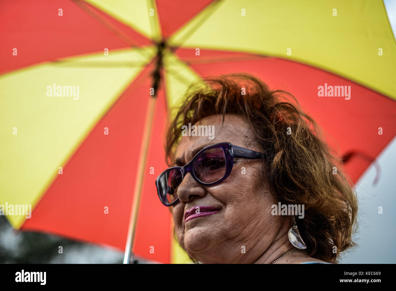 October 12, 2017 - Barcelona, Catalonia, Spain - A woman carries an ...