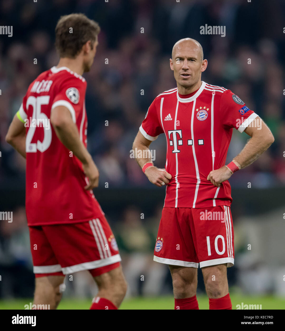 Munich's Thomas Mueller and Arjen Robben react during the UEFA ...