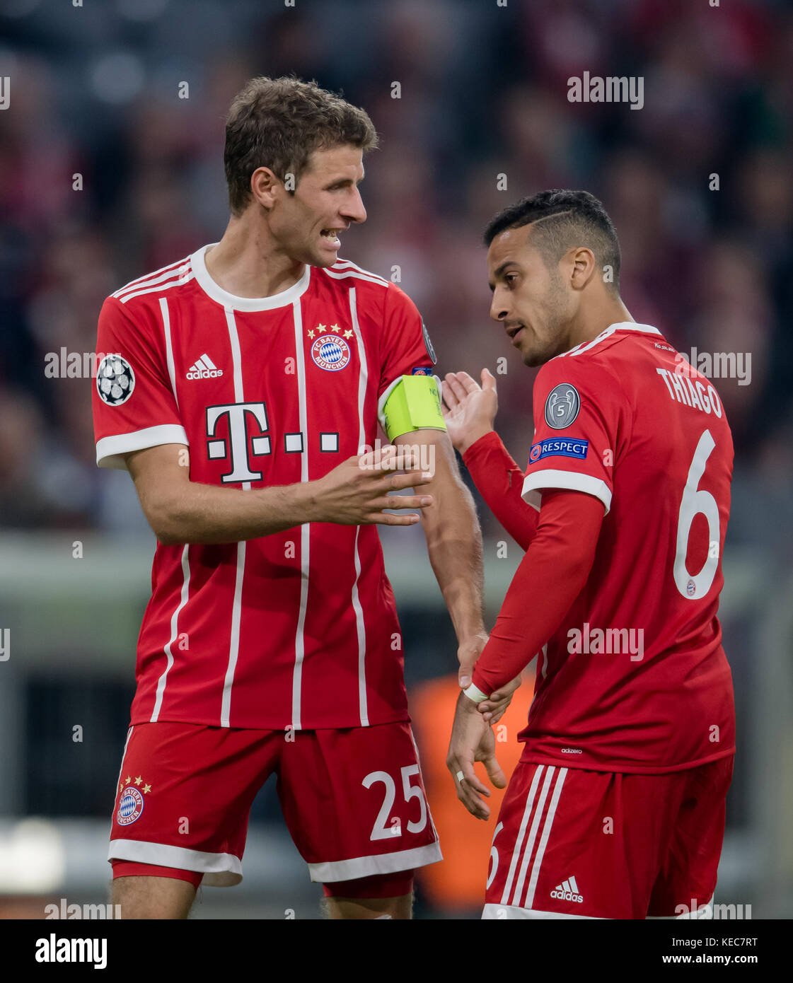 Munich's Thomas Mueller and Thiago Alcantara react during the UEFA ...