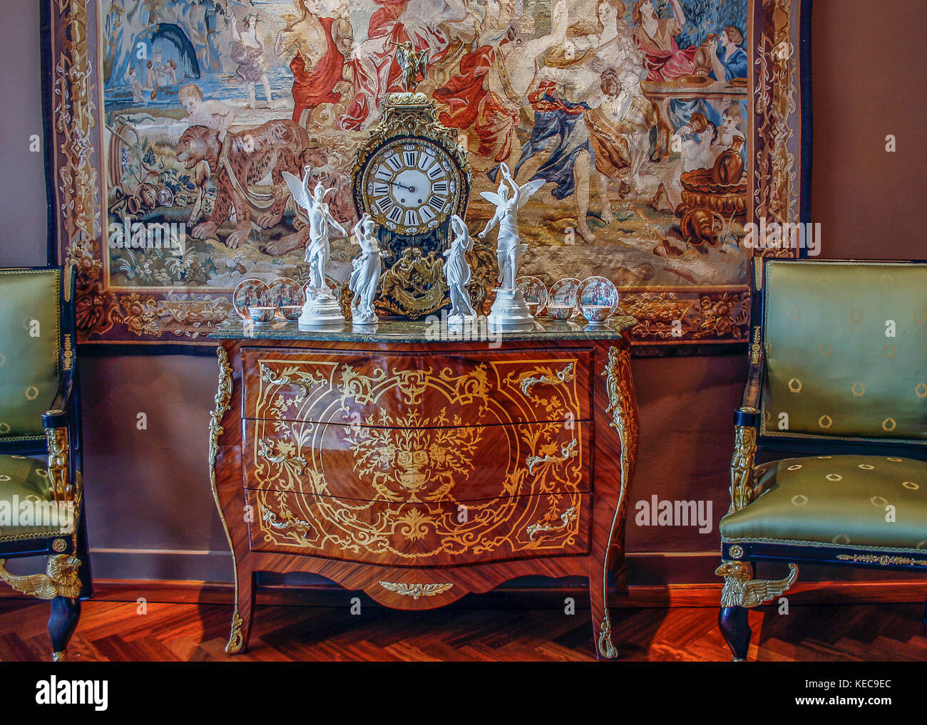 Antique interior with expensive Boulle clock, Biscuit porcelain and ...