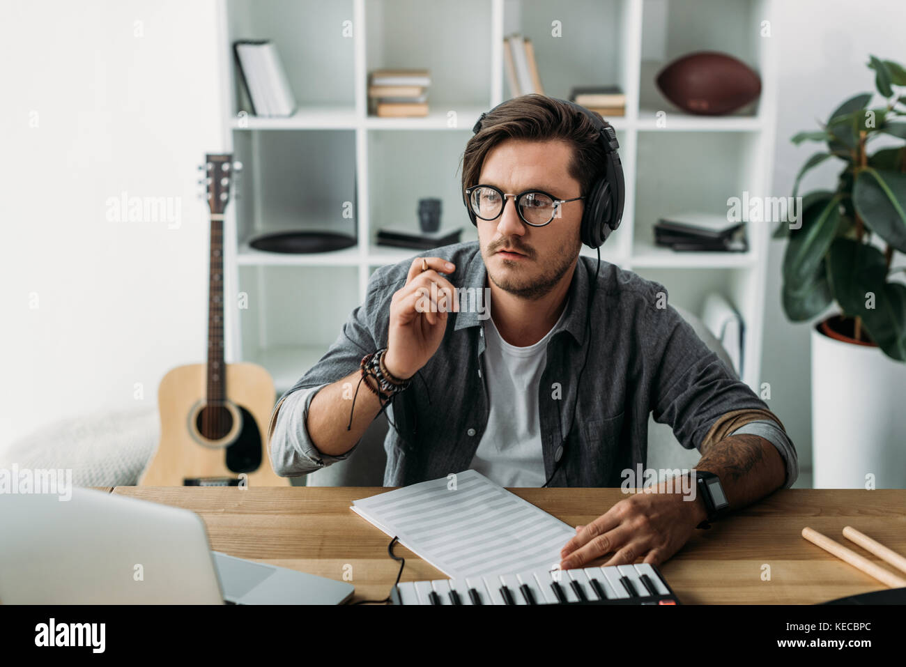 musician thinking about new composition Stock Photo - Alamy