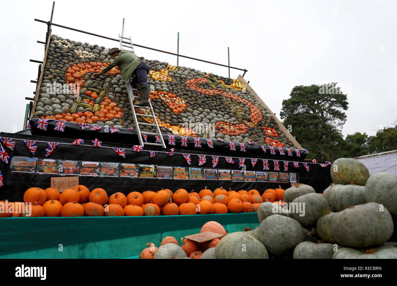 Artist Mark Ford puts the final touches to a Snakes and Ladders themed ...