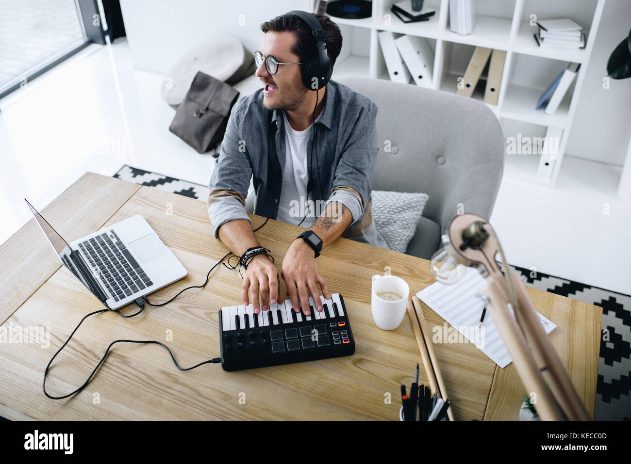 Young happy male composer hi-res stock photography and images - Alamy