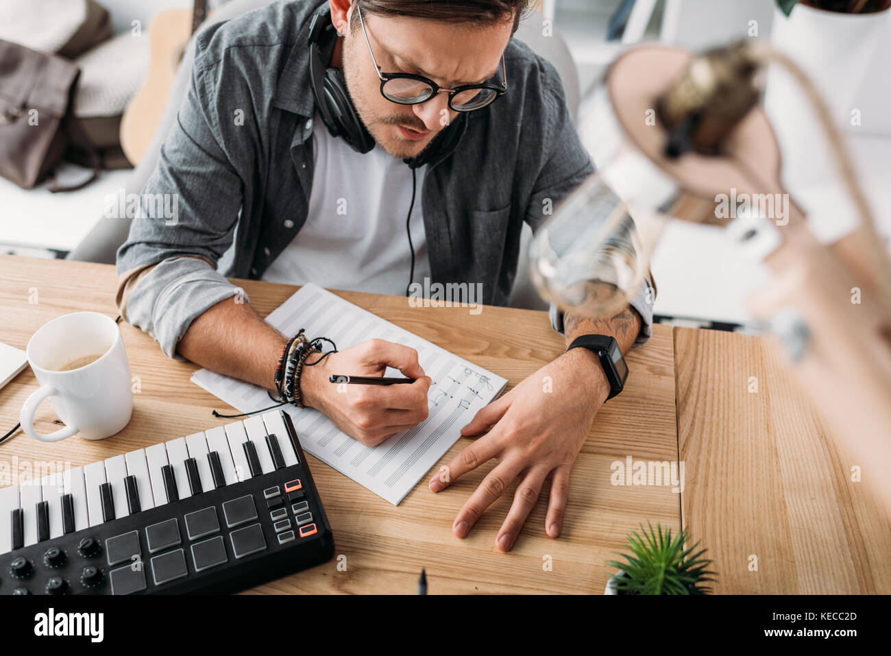 musician writing notes Stock Photo - Alamy