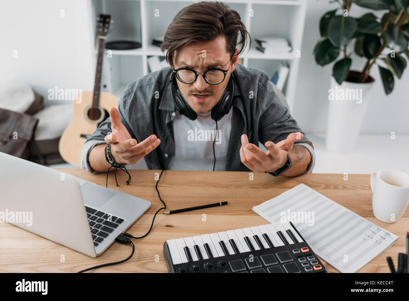 angry young musician Stock Photo - Alamy