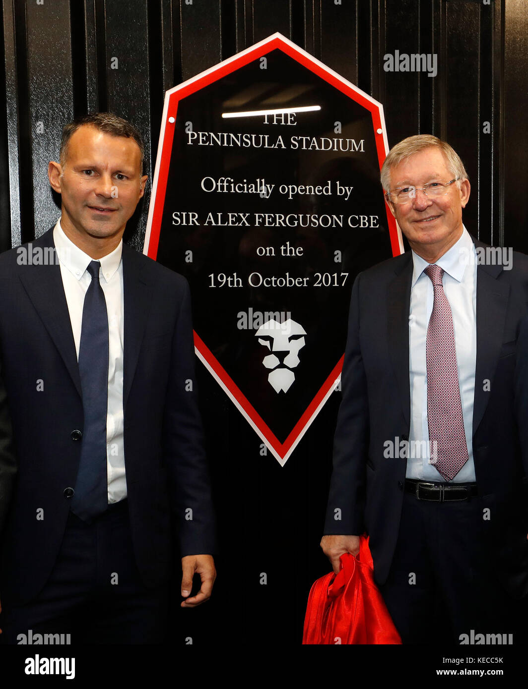 Sir Alex Ferguson unveils a plaque to commemorate the announcement that ...