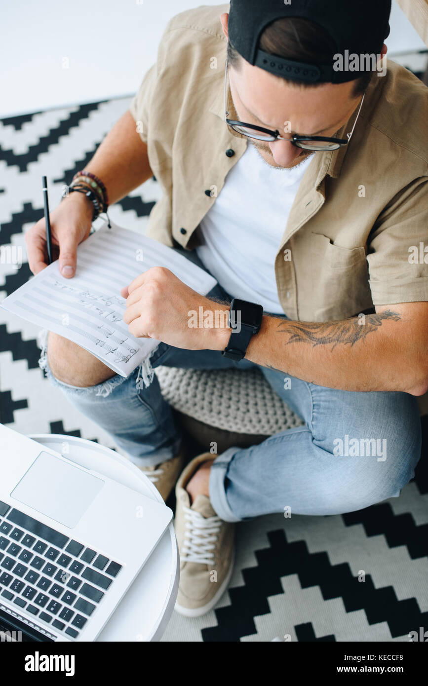man looking at watch Stock Photo - Alamy