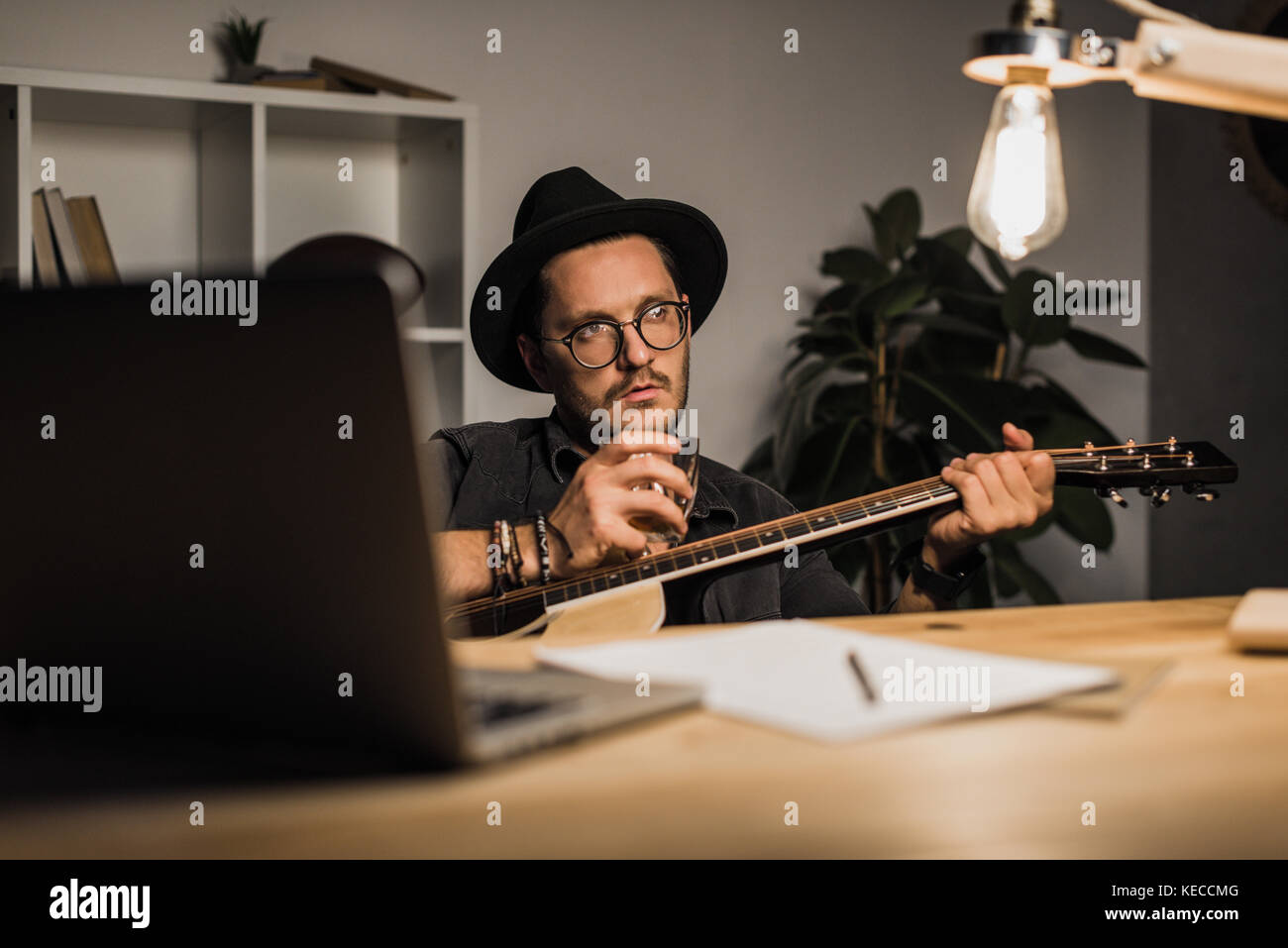 young man playing guitar Stock Photo - Alamy