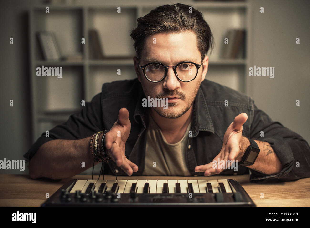 man with keyboard controller Stock Photo - Alamy