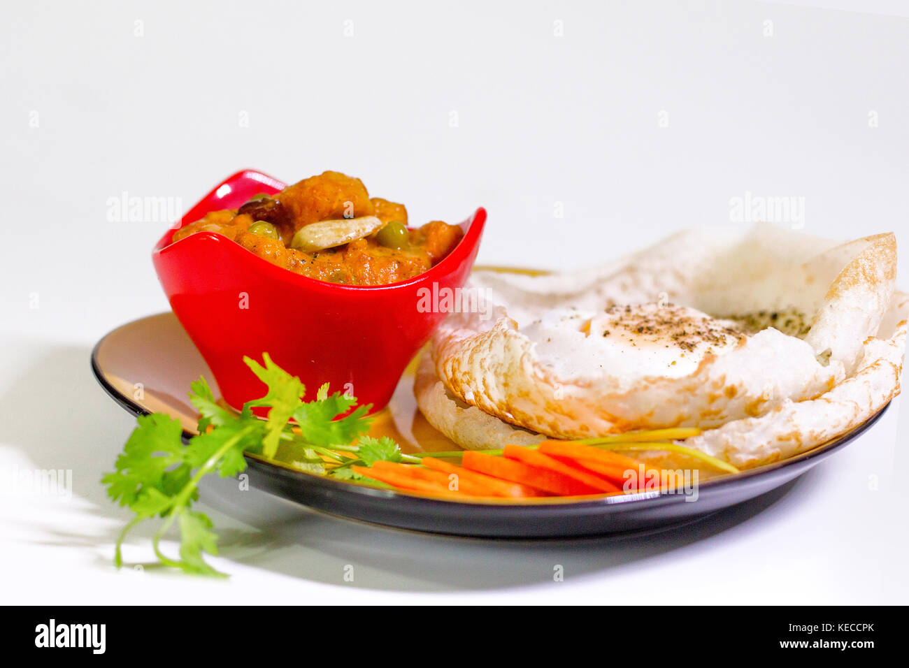 rice made Pappam with chicken/ mutton / prawns / fish curry and green ...