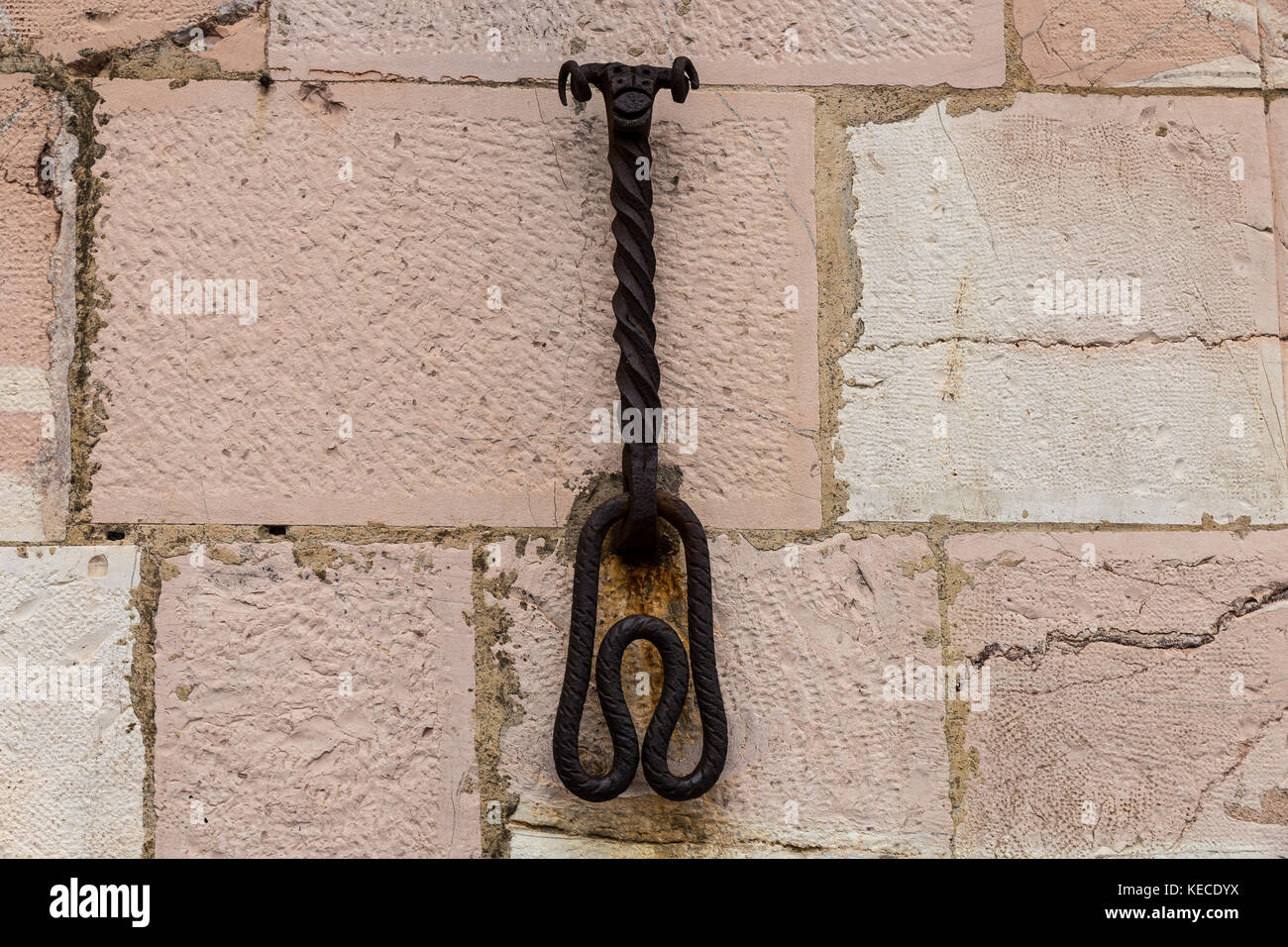 medieval stone wall with ancient ironwork Stock Photo - Alamy