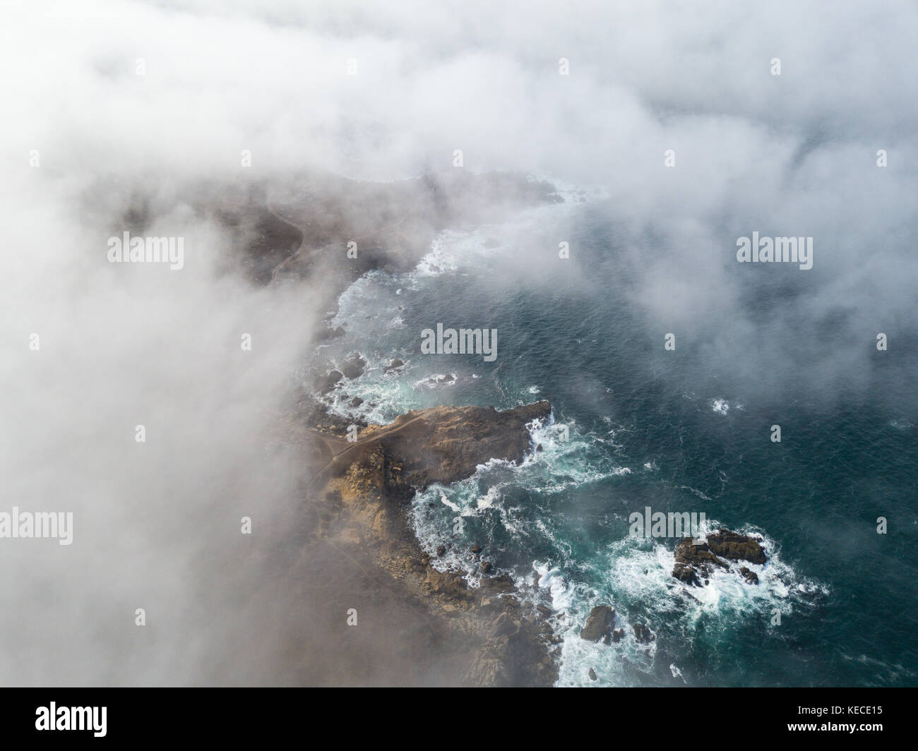 Fog begins to drift over the scenic northern California coastline in ...