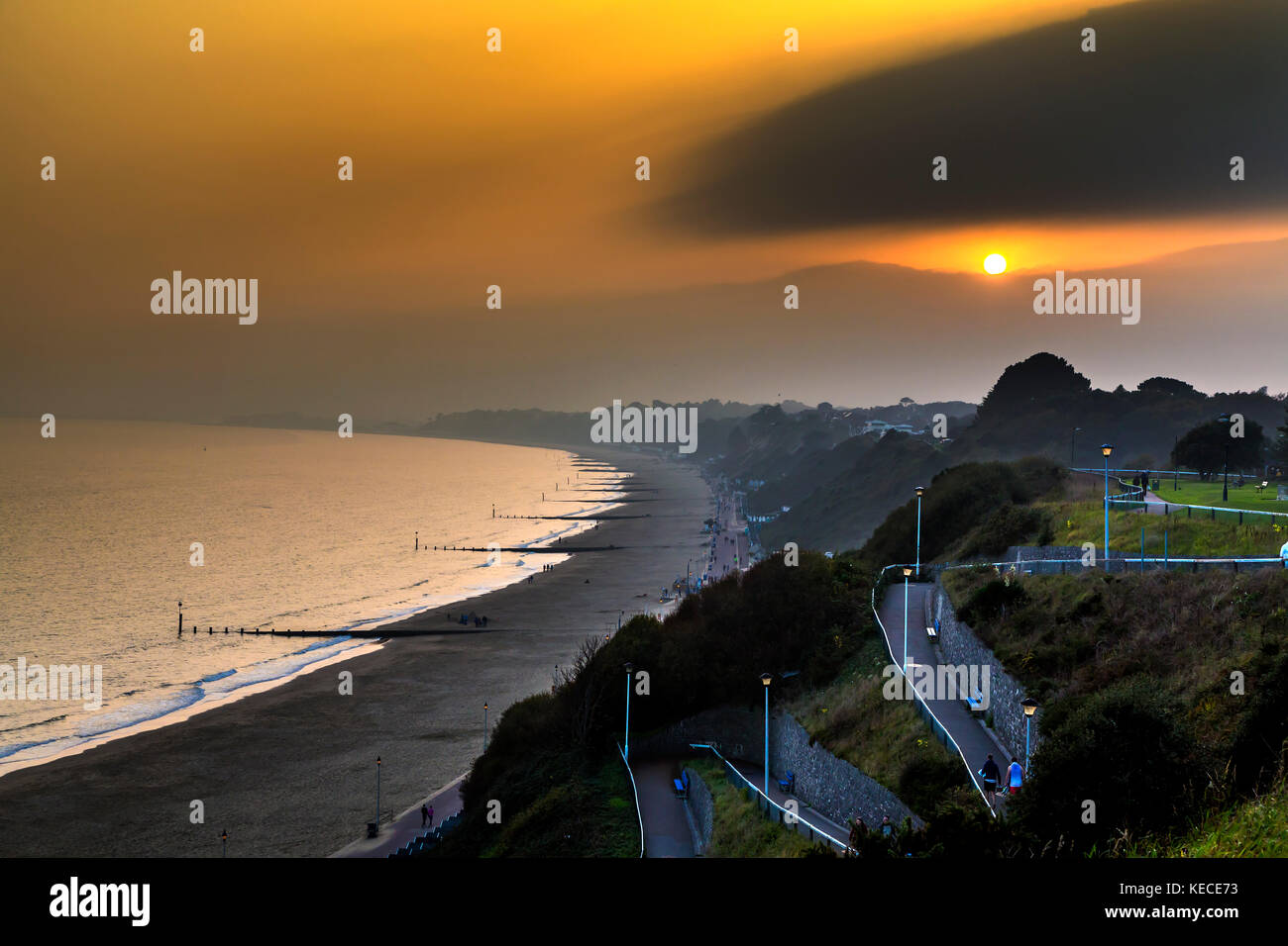 SUNSET AT BOURNEMOUTH BEACH SHOWING ONE OF THE PATHS LEADING DOWN TO ...