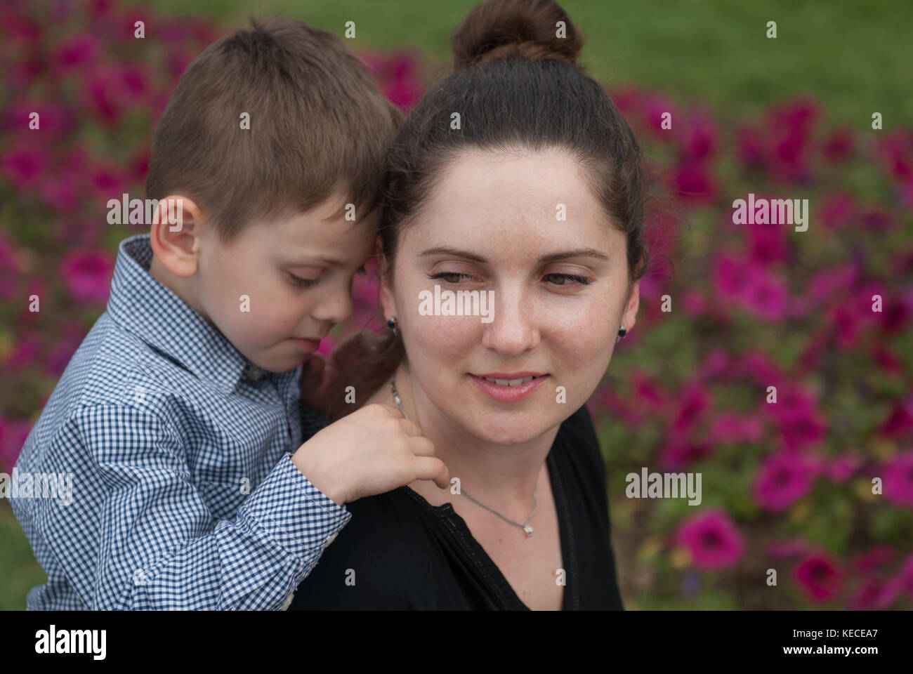 portrait of smiling mother and her cute little son Stock Photo - Alamy