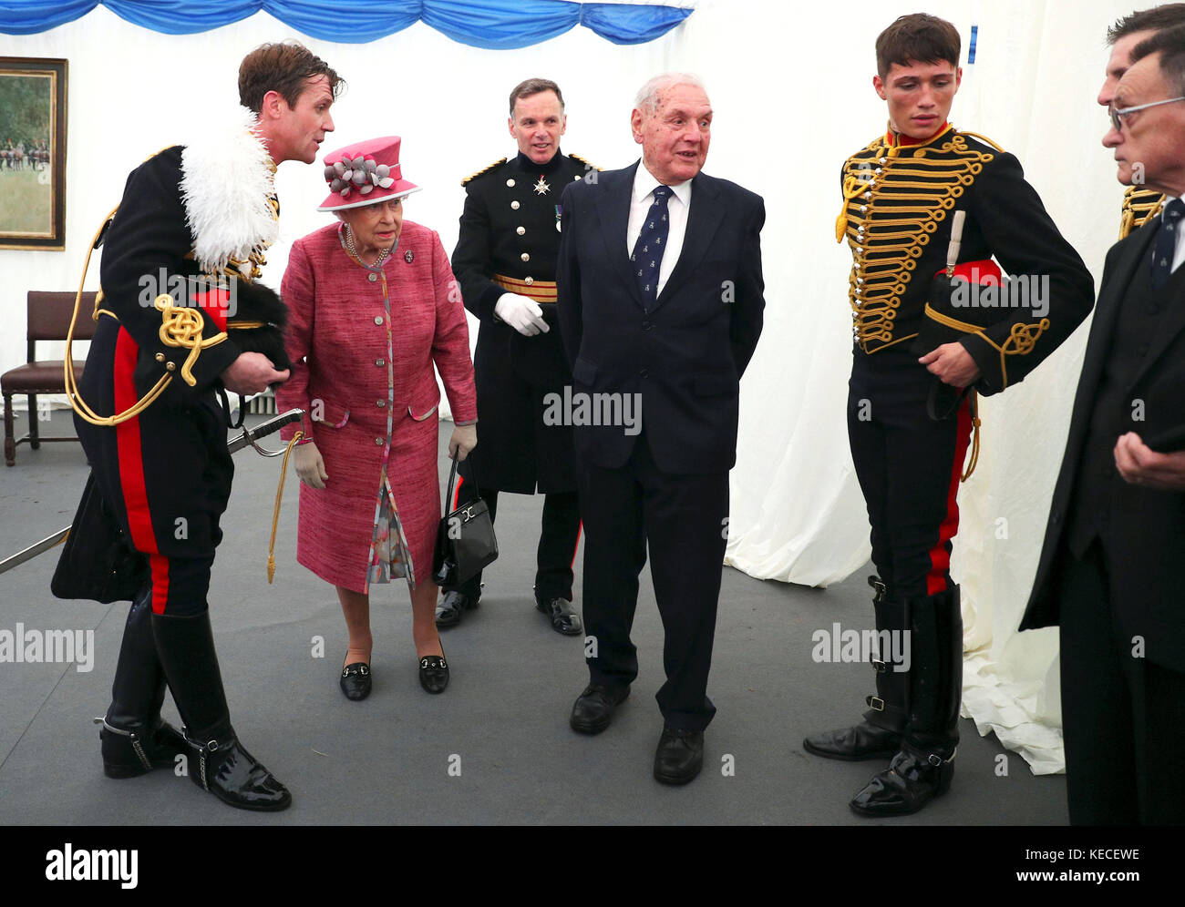 Queen Elizabeth II meets veteran Percy Austen (third left) during a ...