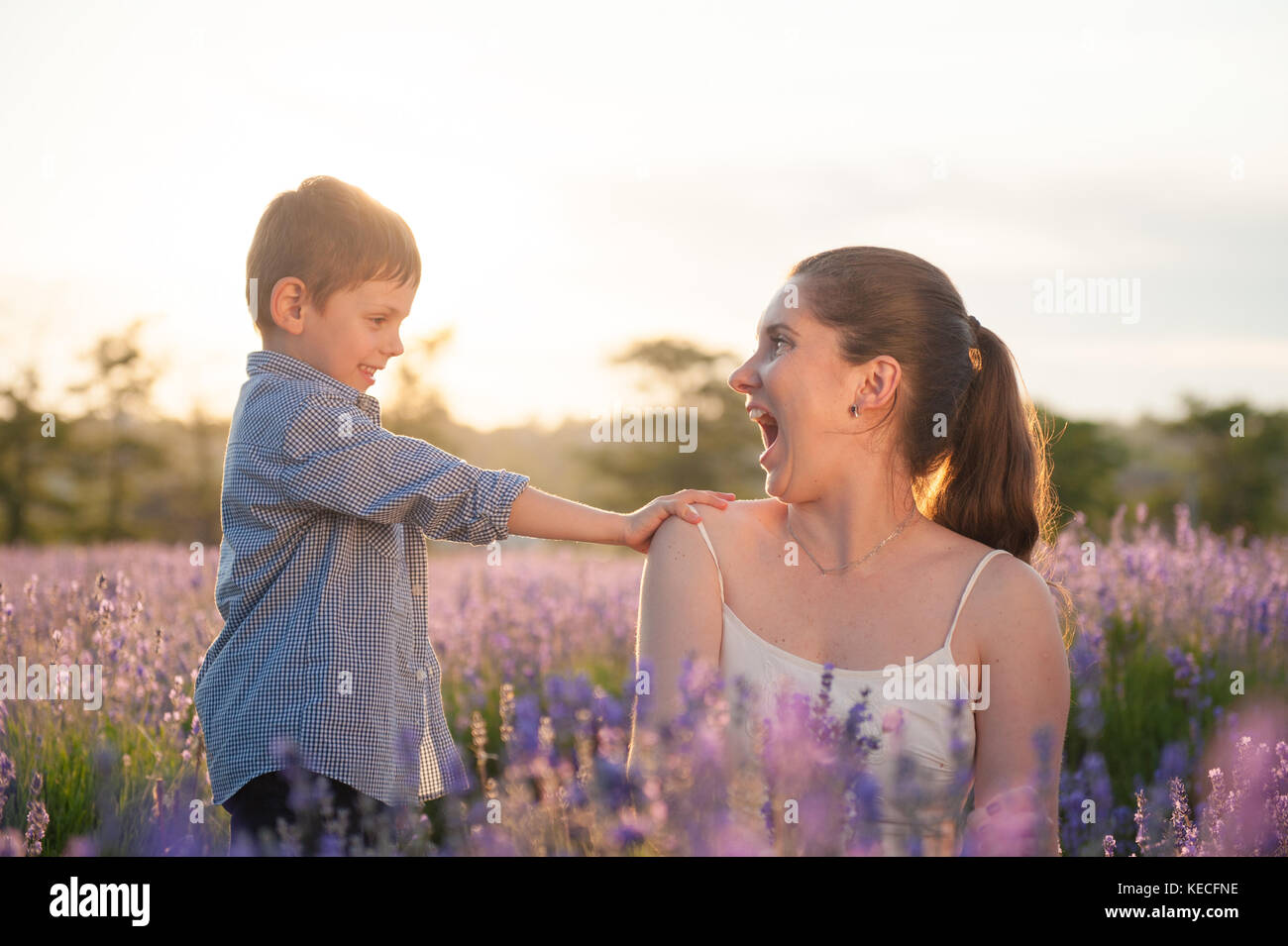 Child touch shoulder hi-res stock photography and images - Alamy
