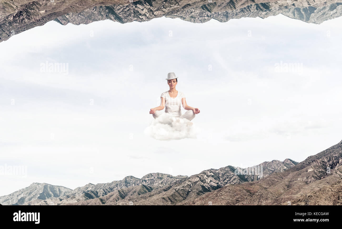 Young woman keeping mind conscious Stock Photo - Alamy