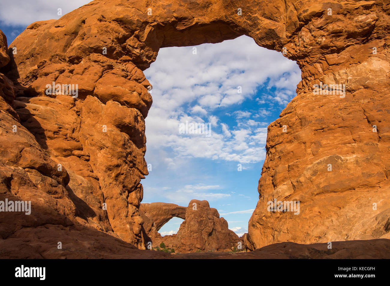South window arch seen through Turret arch, Arches National Park, Utah ...