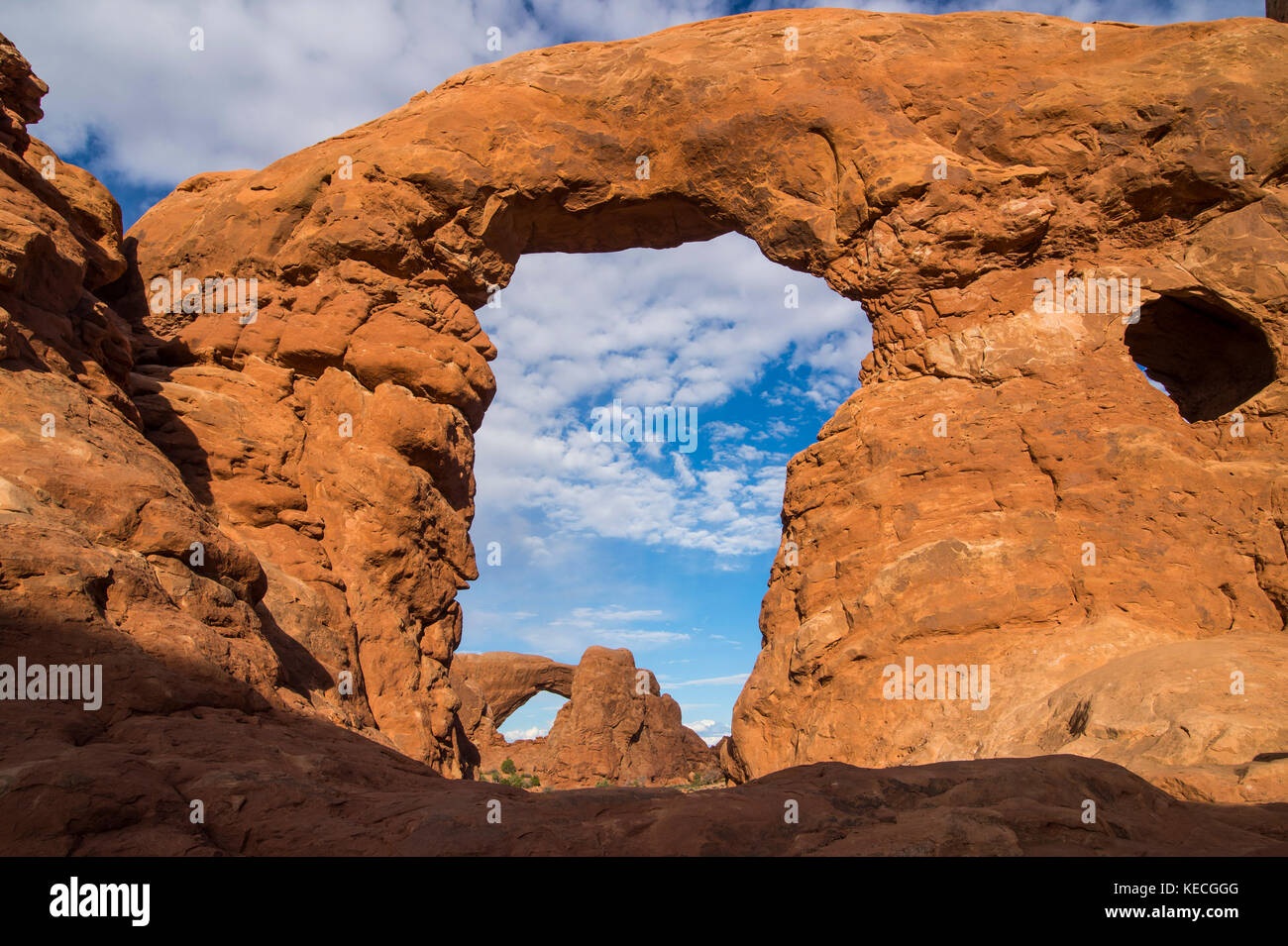 South window arch seen through Turret arch, Arches National Park, Utah ...