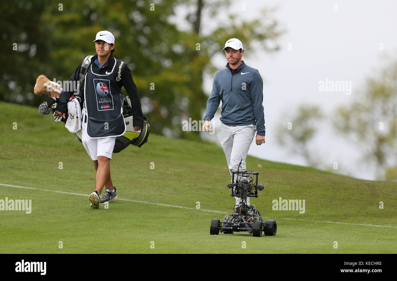 Northern Ireland's Rory McIlroy (right) with caddy Harry Diamond walk ...