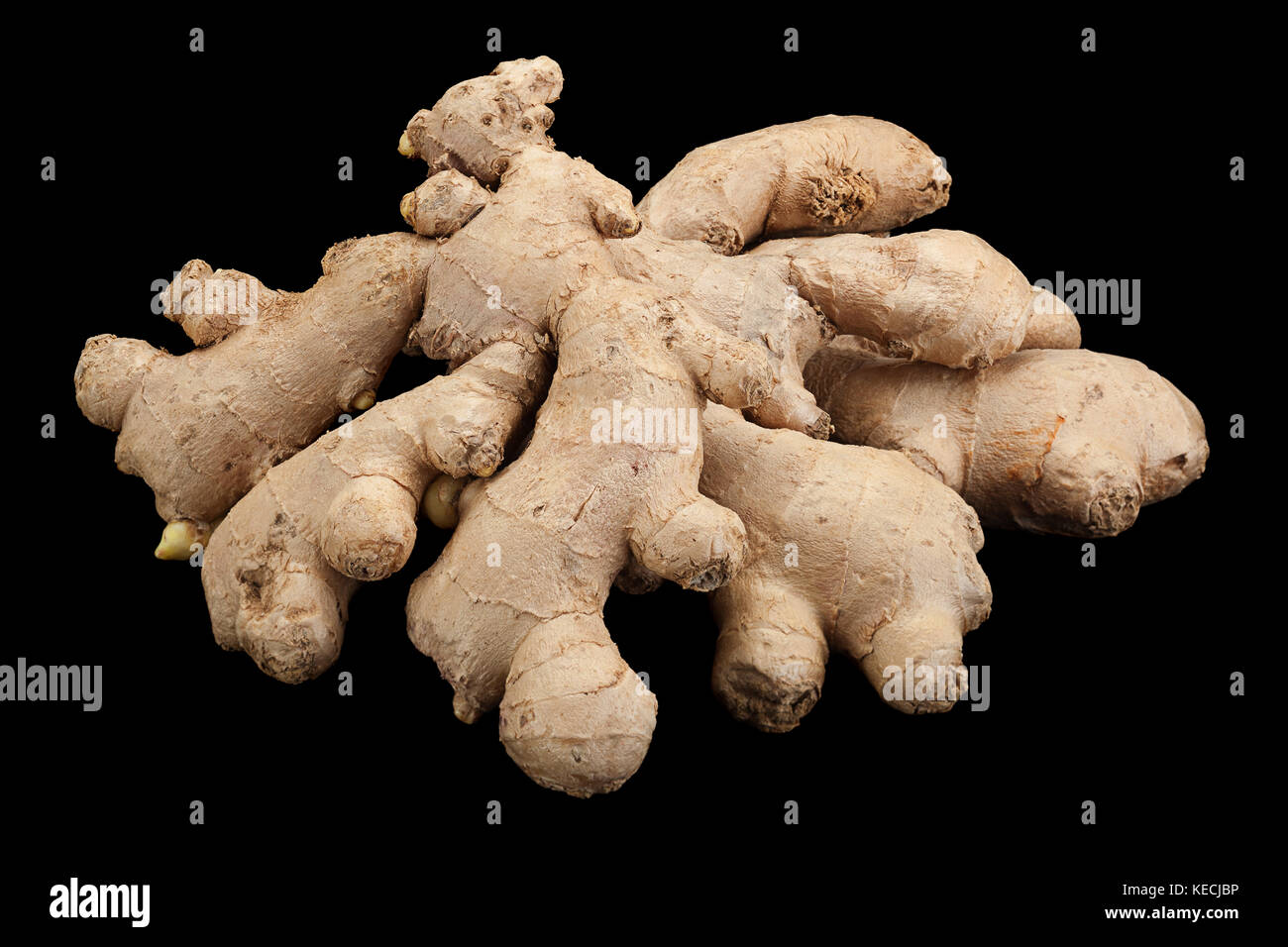 Ginger spice root isolated on black background Stock Photo - Alamy