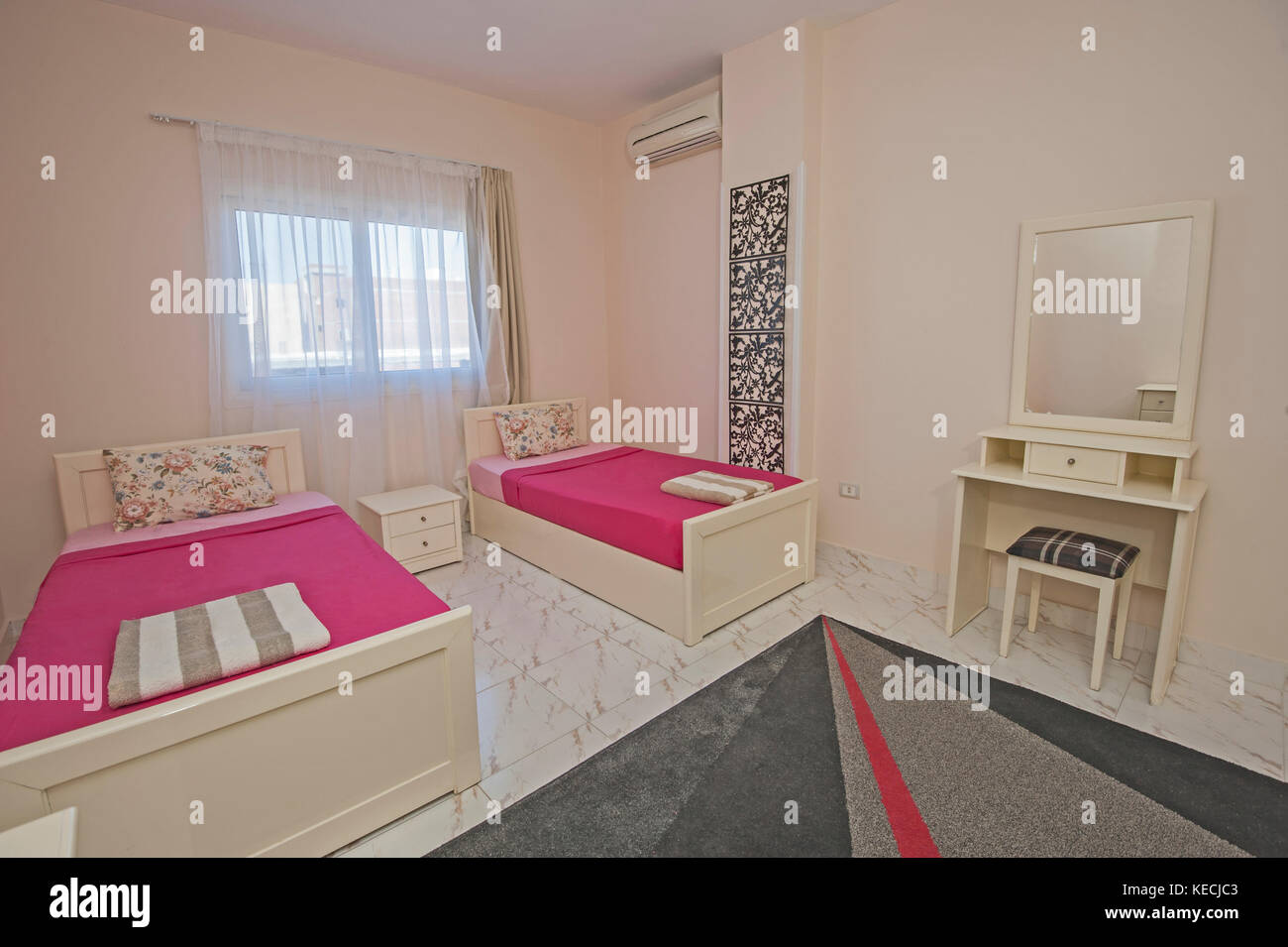 Interior design of bedroom in apartment with twin beds and furniture ...
