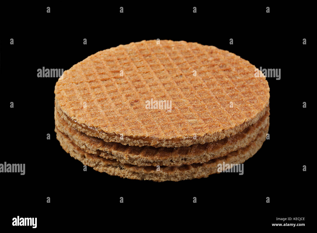 Holland round waffles with caramel isolated on black background Stock ...