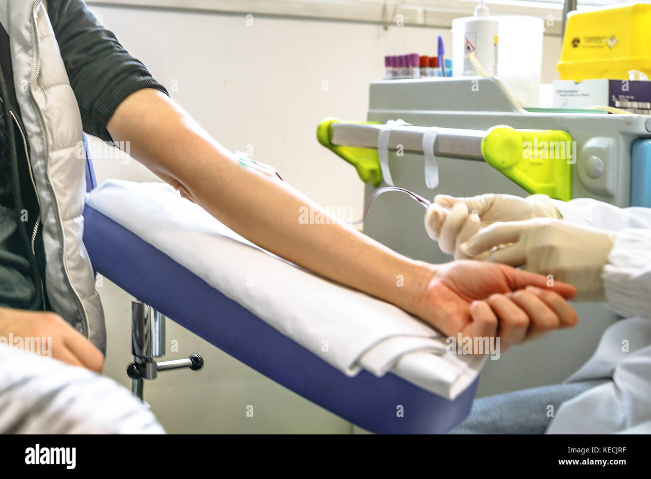 Blood drawing woman Stock Photo - Alamy