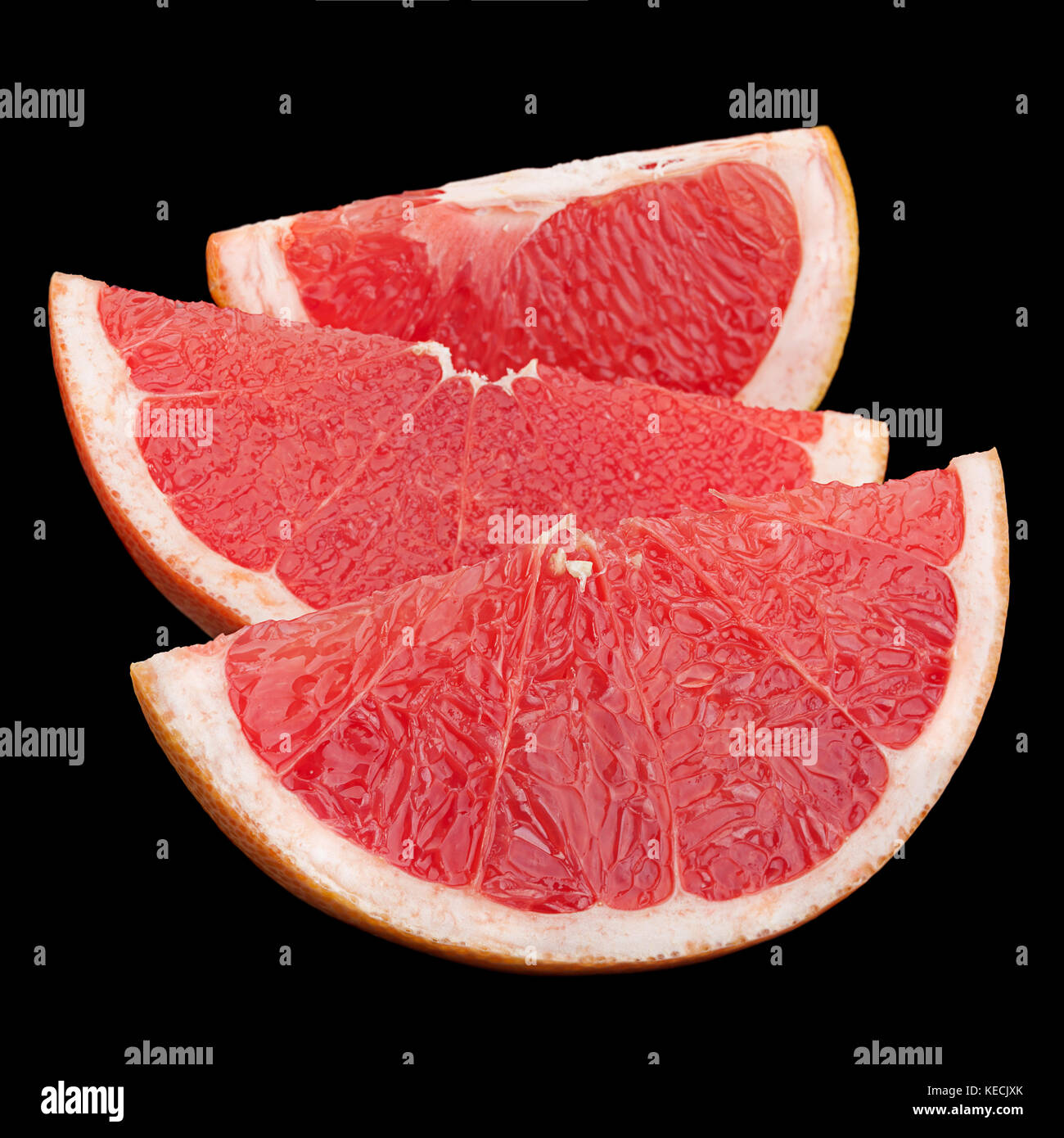 Orange grapefruit closeup isolated on black background Stock Photo - Alamy