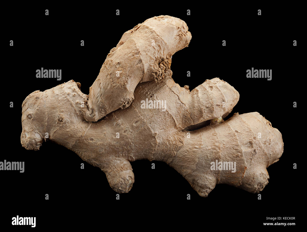 Ginger spice root isolated on black background Stock Photo - Alamy