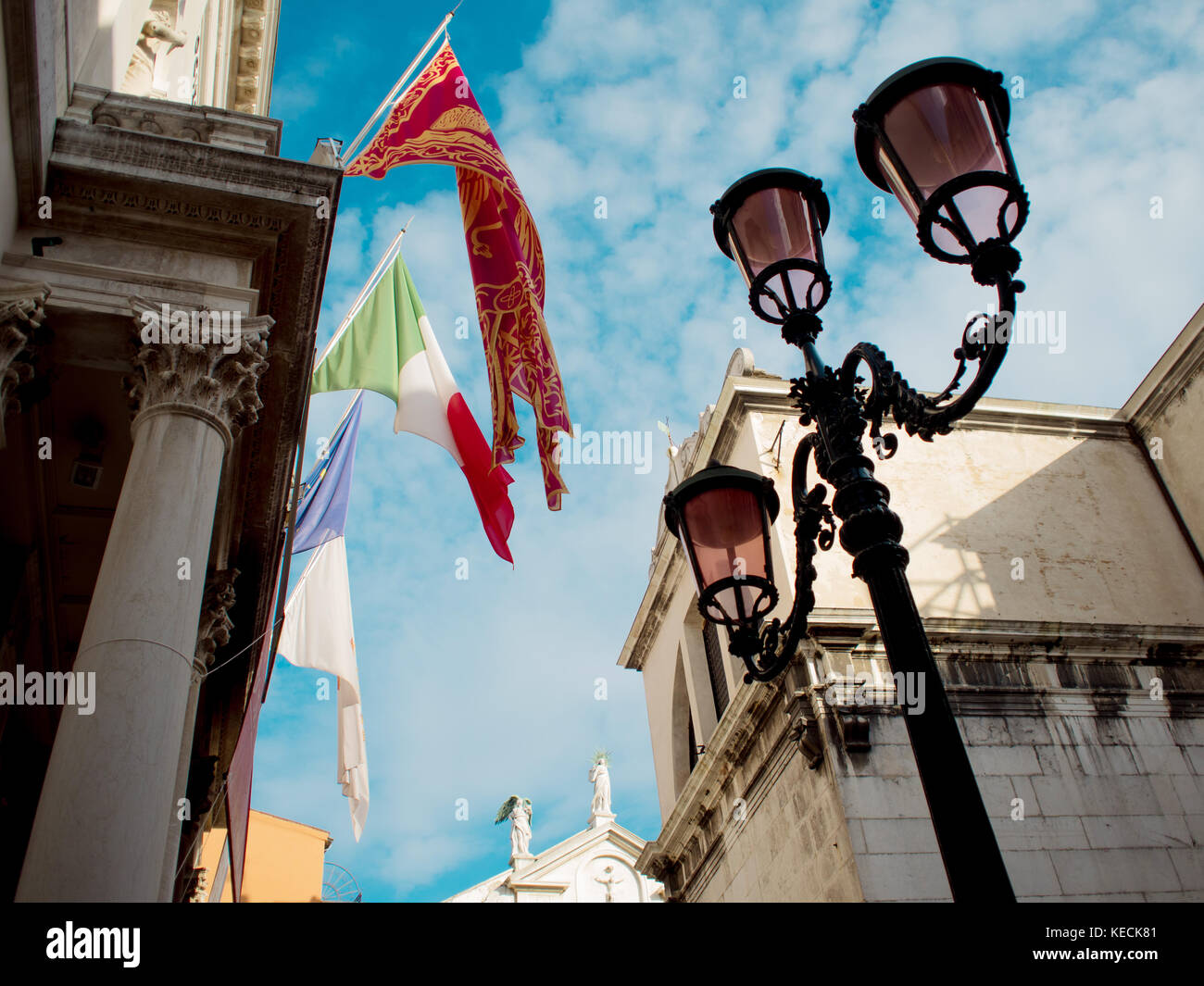 Venice, Lamp post flags Stock Photo - Alamy