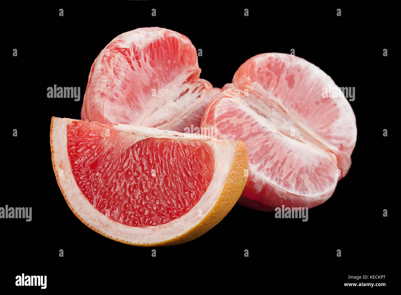 Orange grapefruit closeup isolated on black background Stock Photo - Alamy