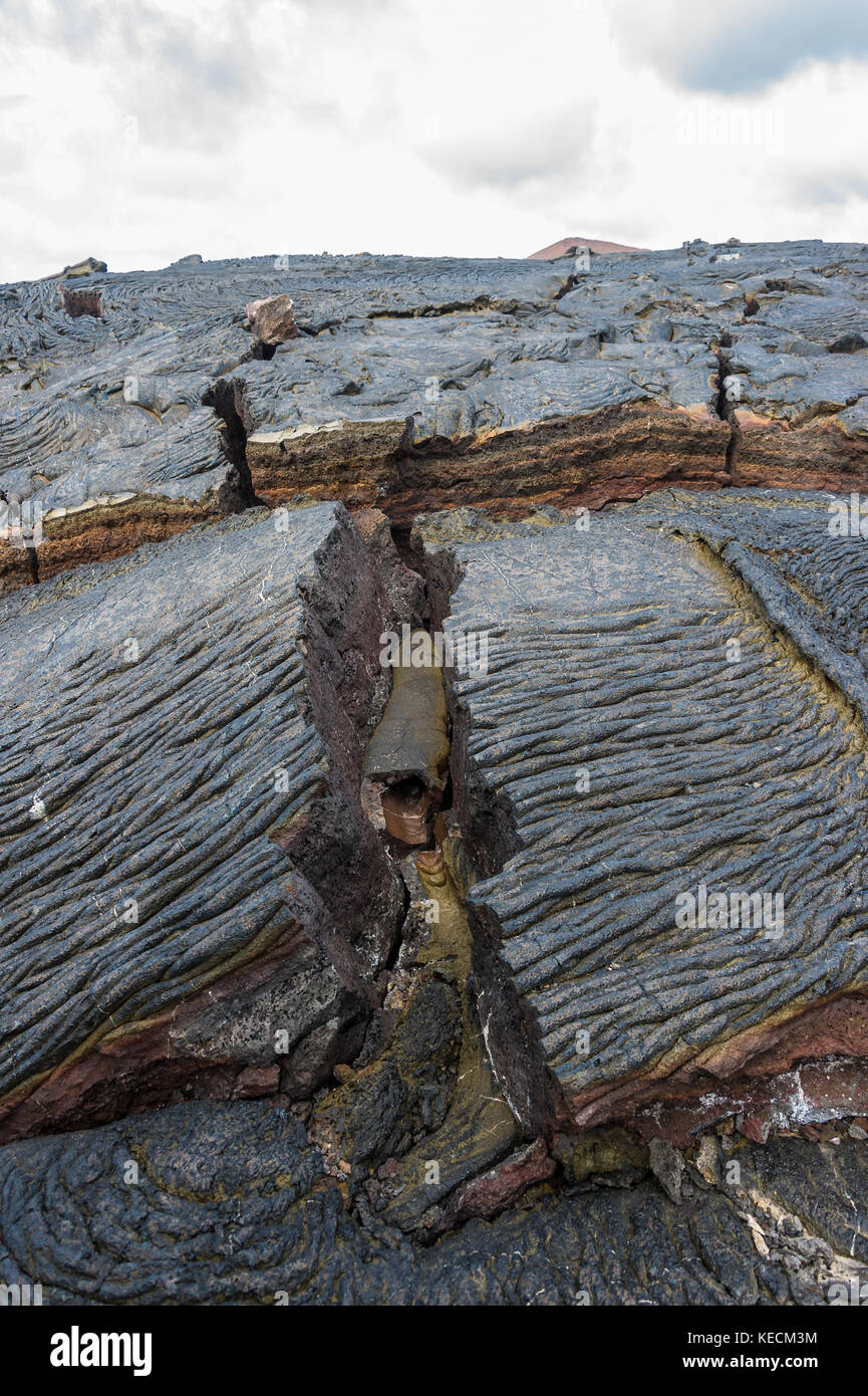 A lava tube within pahoehoe or rope lava, on Rabida Island, Galapagos ...