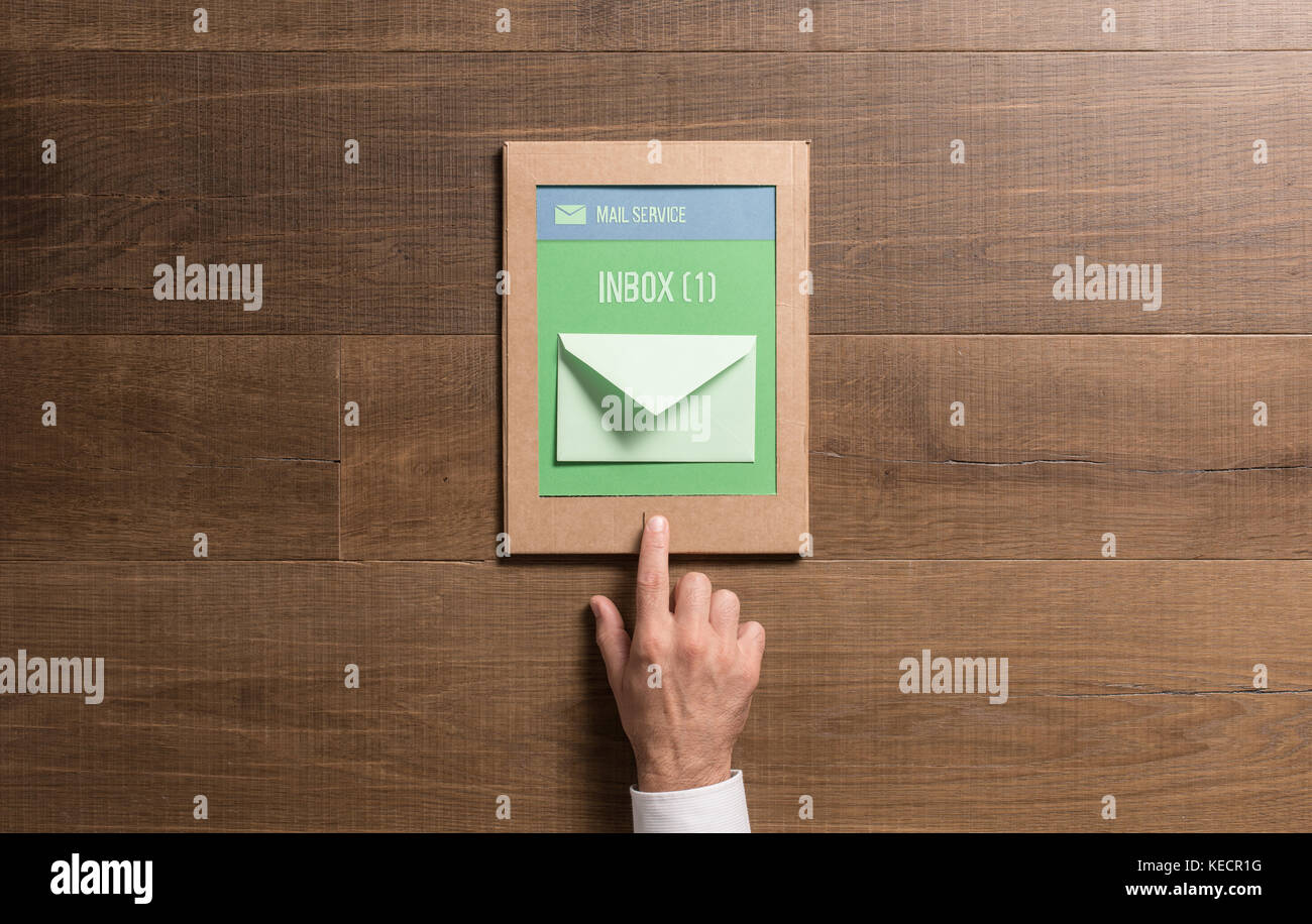 Man using an eco-friendly creative tablet made from recycled cardboard ...