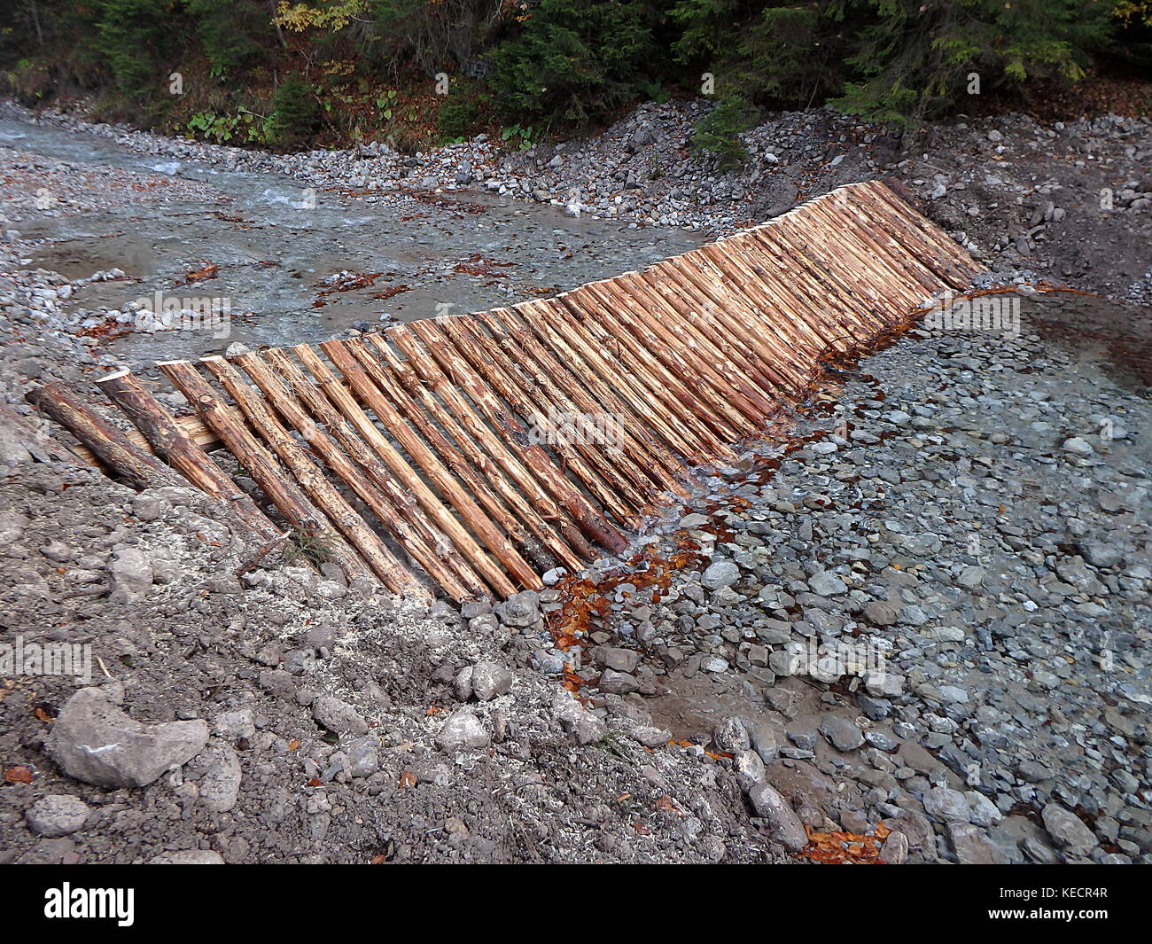 Wooden dam on a mountain river, Traditional structure for floating ...