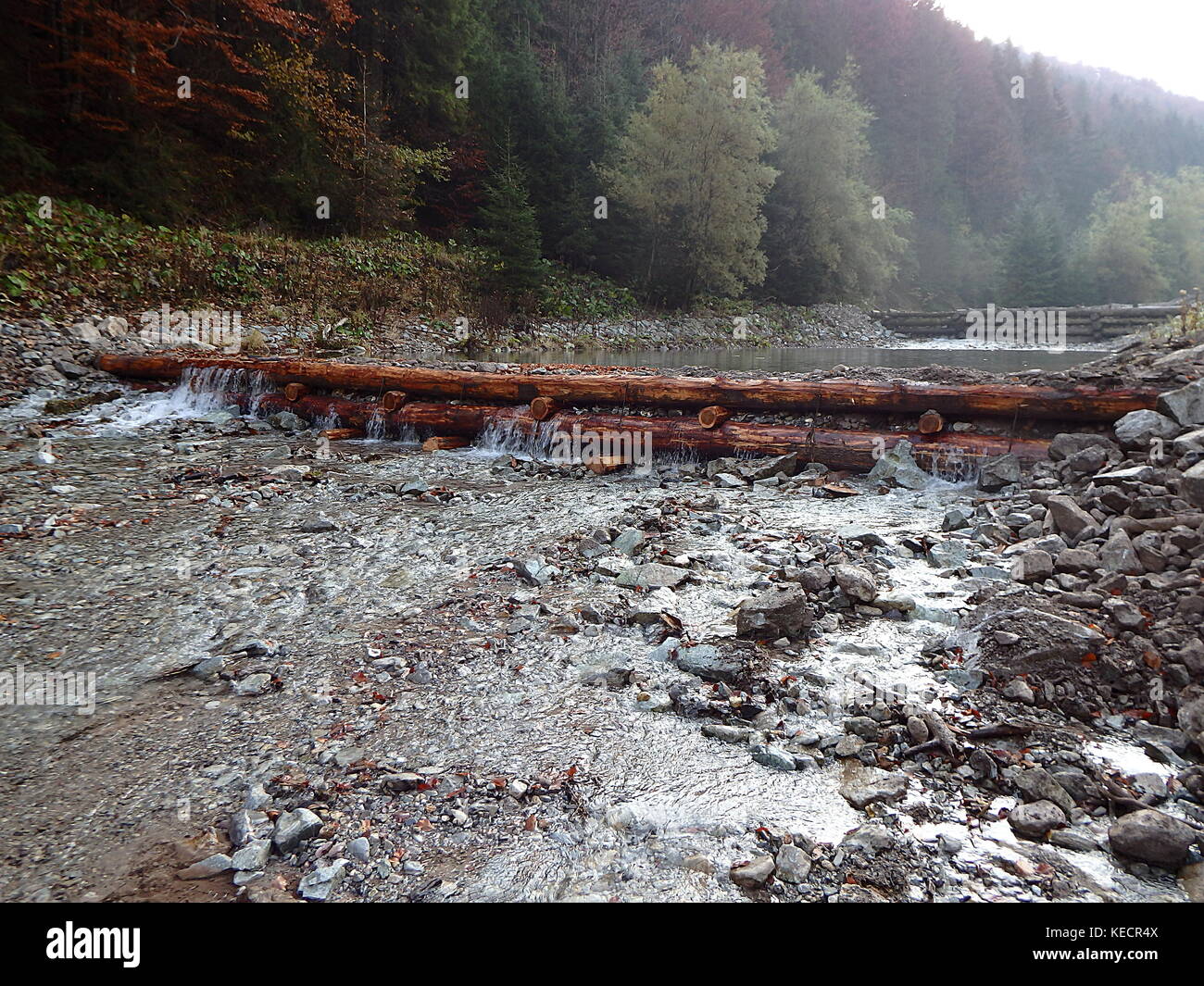 Wooden dam on a mountain river, Traditional structure for floating ...