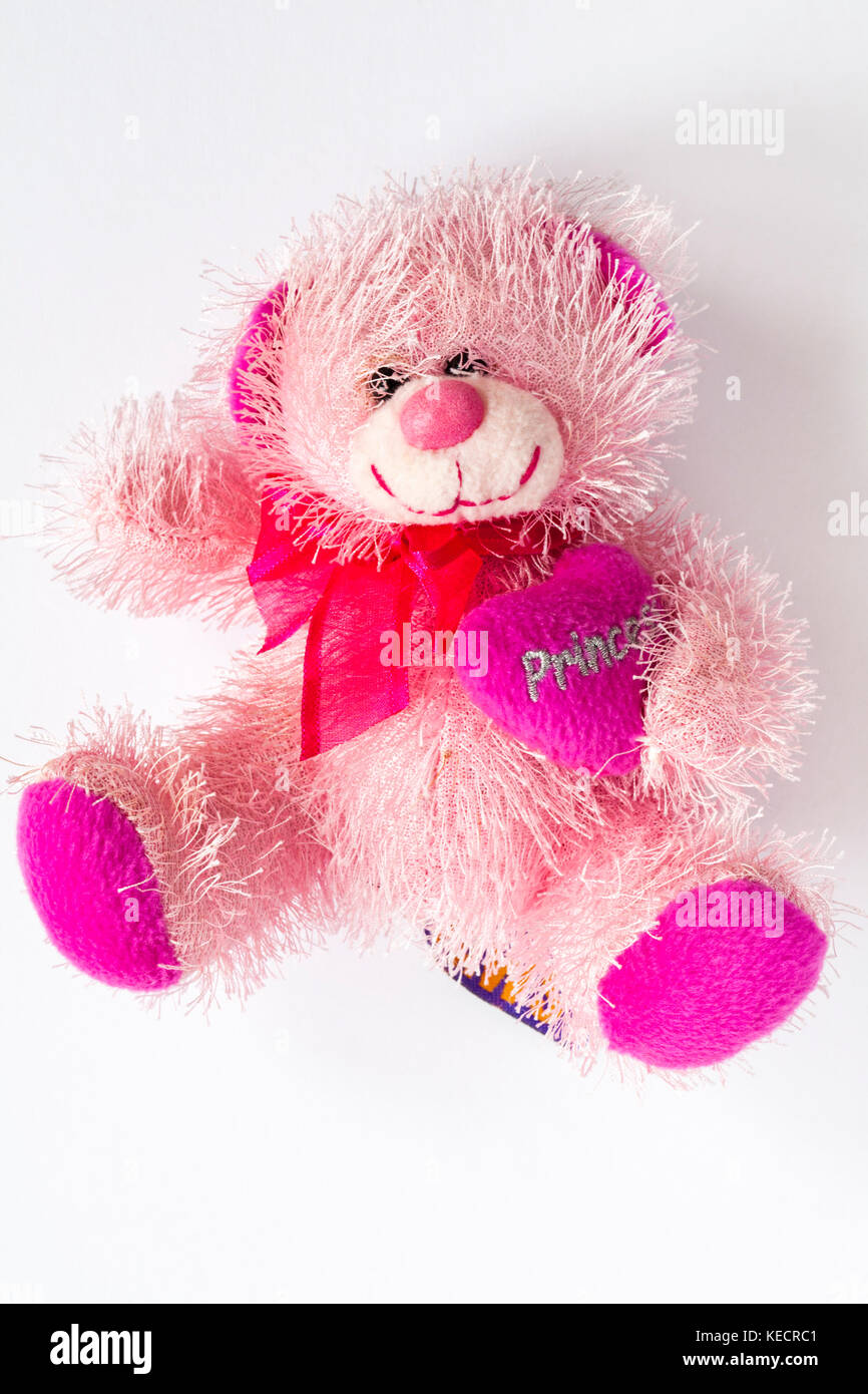 Pink fluffy teddy Bear soft cuddly toy holding Princess heart isolated ...