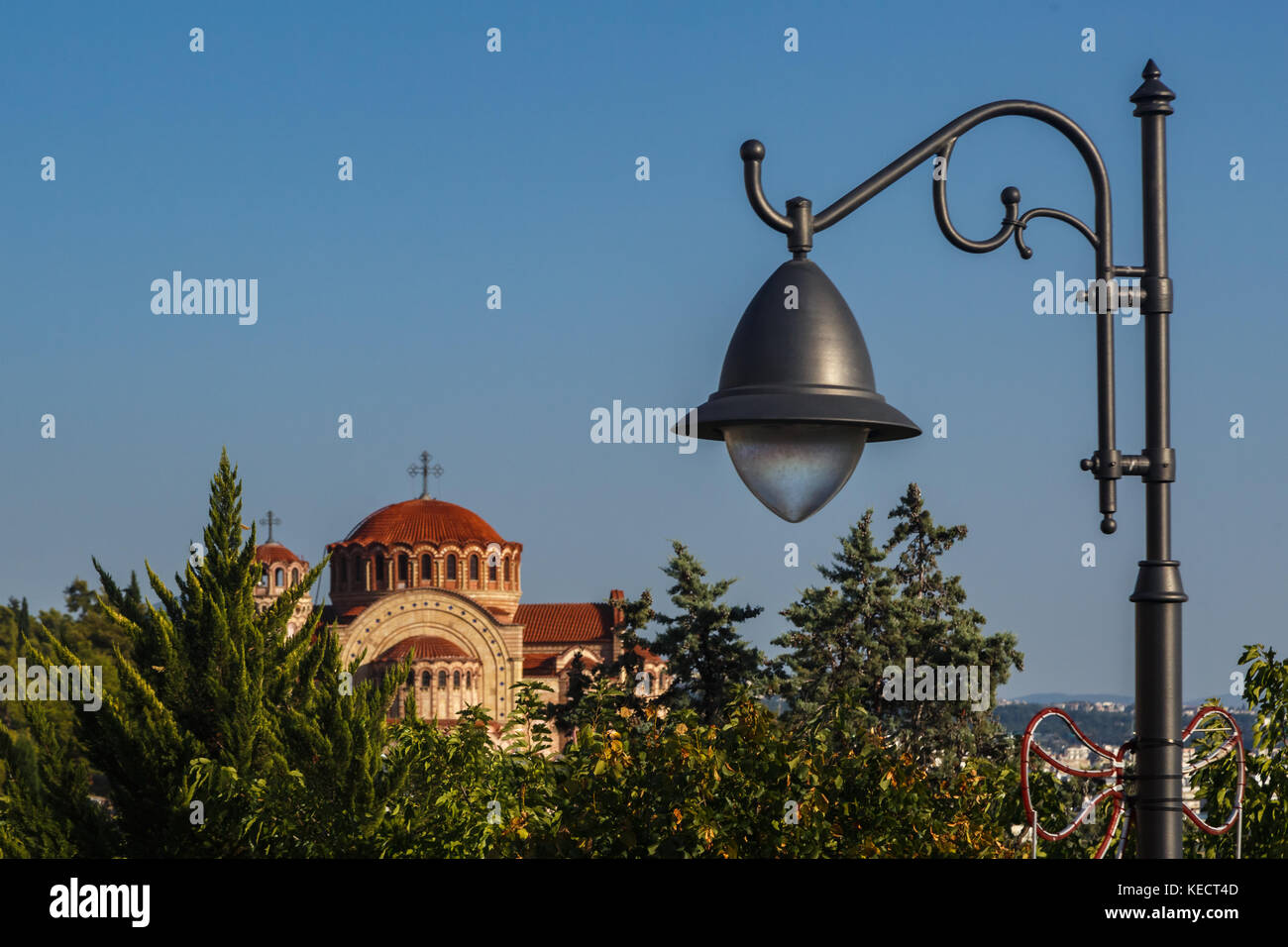 one urban metal lantern with one lamp just against a clear sky and an ...