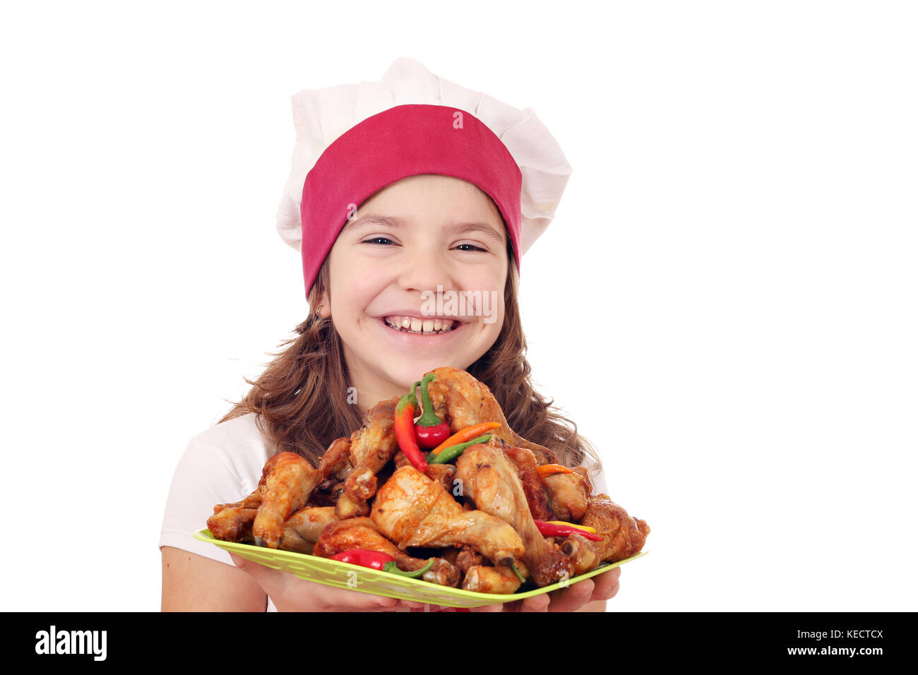 happy little girl cook with chicken drumsticks Stock Photo - Alamy