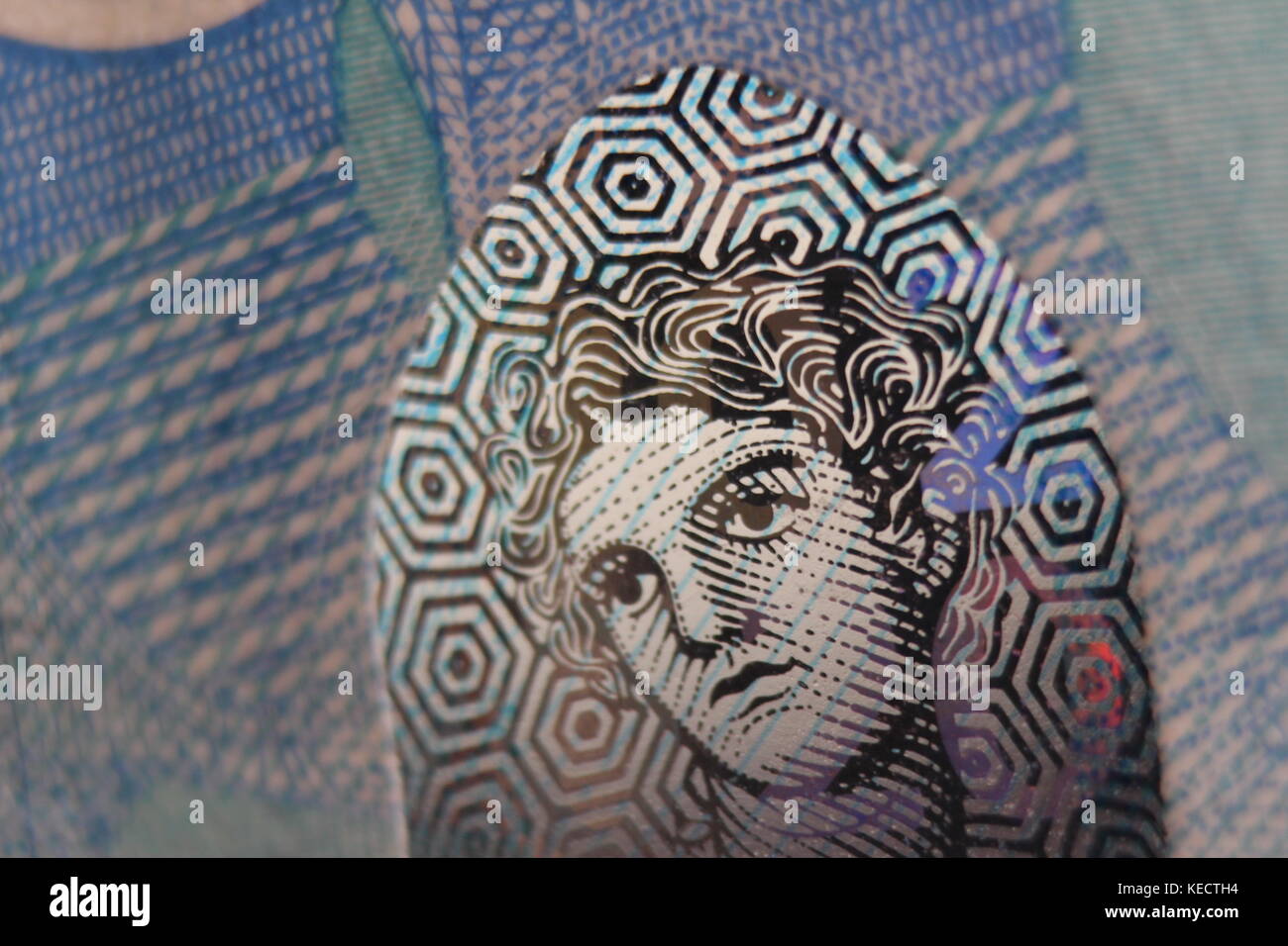 Macro close-up of euro bill with holographic Greek goddess Europa adorn ...